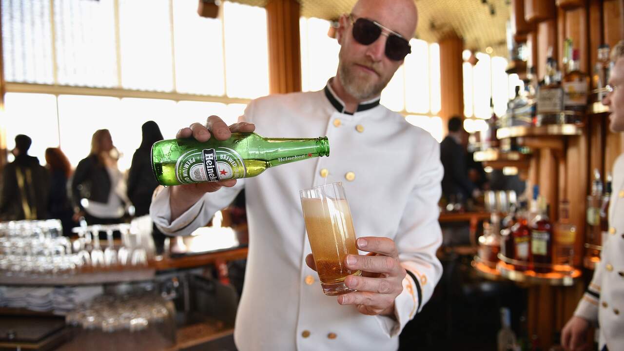 Slecht weer en hogere prijzen maken Heineken-bier minder populair ...